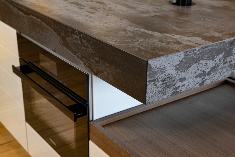 Old world plaster walls with a sleek modern Poggenpohl kitchen