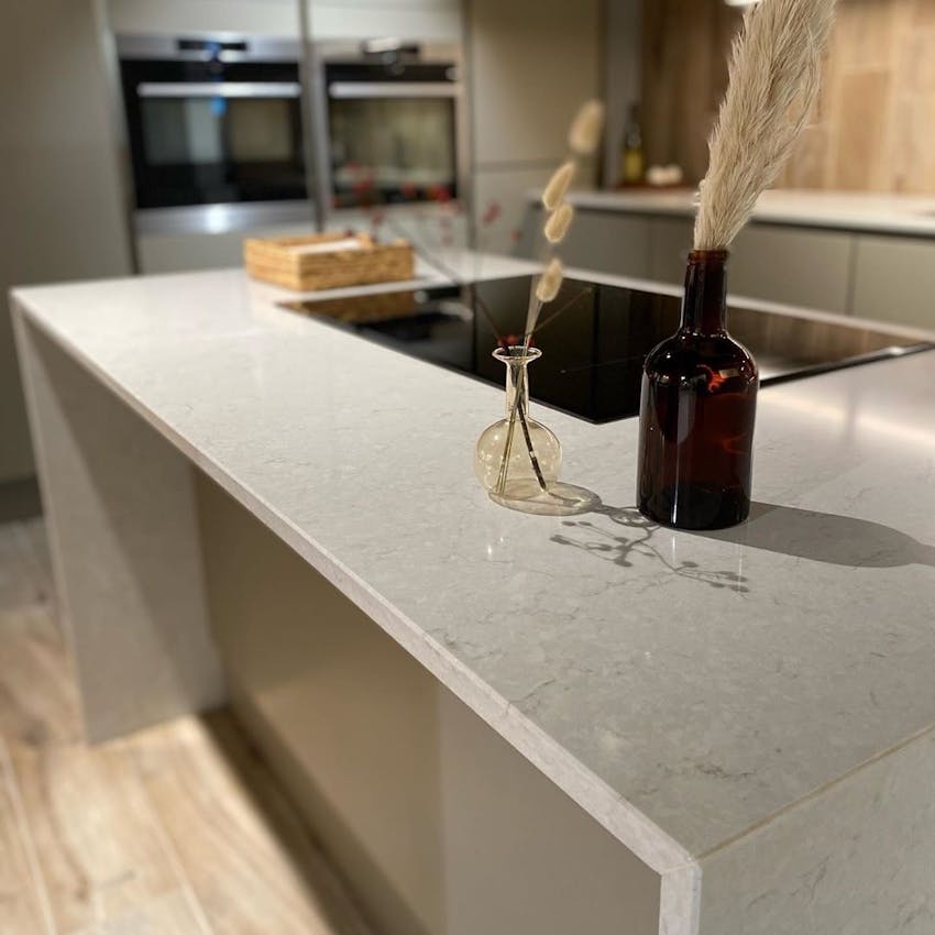 Fresh beige minimalistic kitchen with marbled Silestone Snowy Ibiza